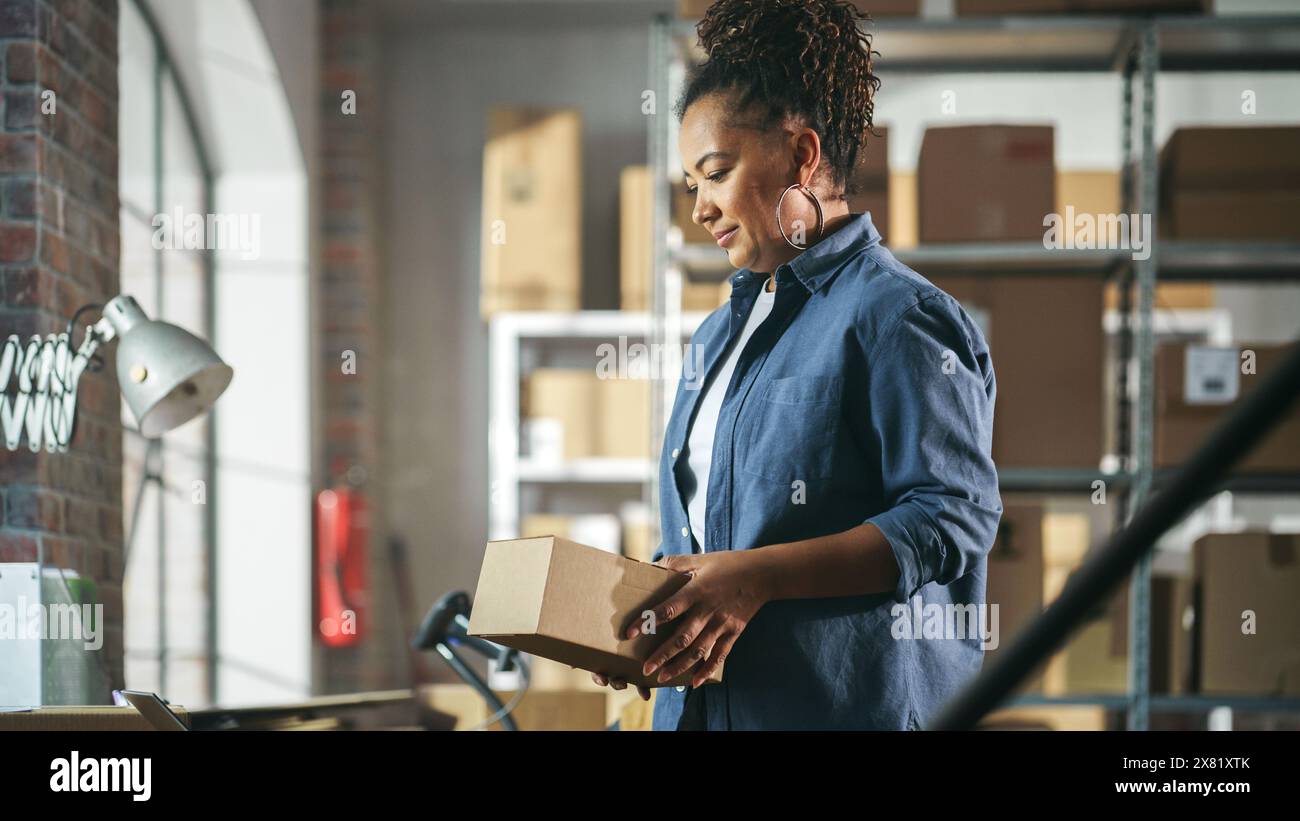 Woman desk parcels laptop hi-res stock photography and images - Alamy