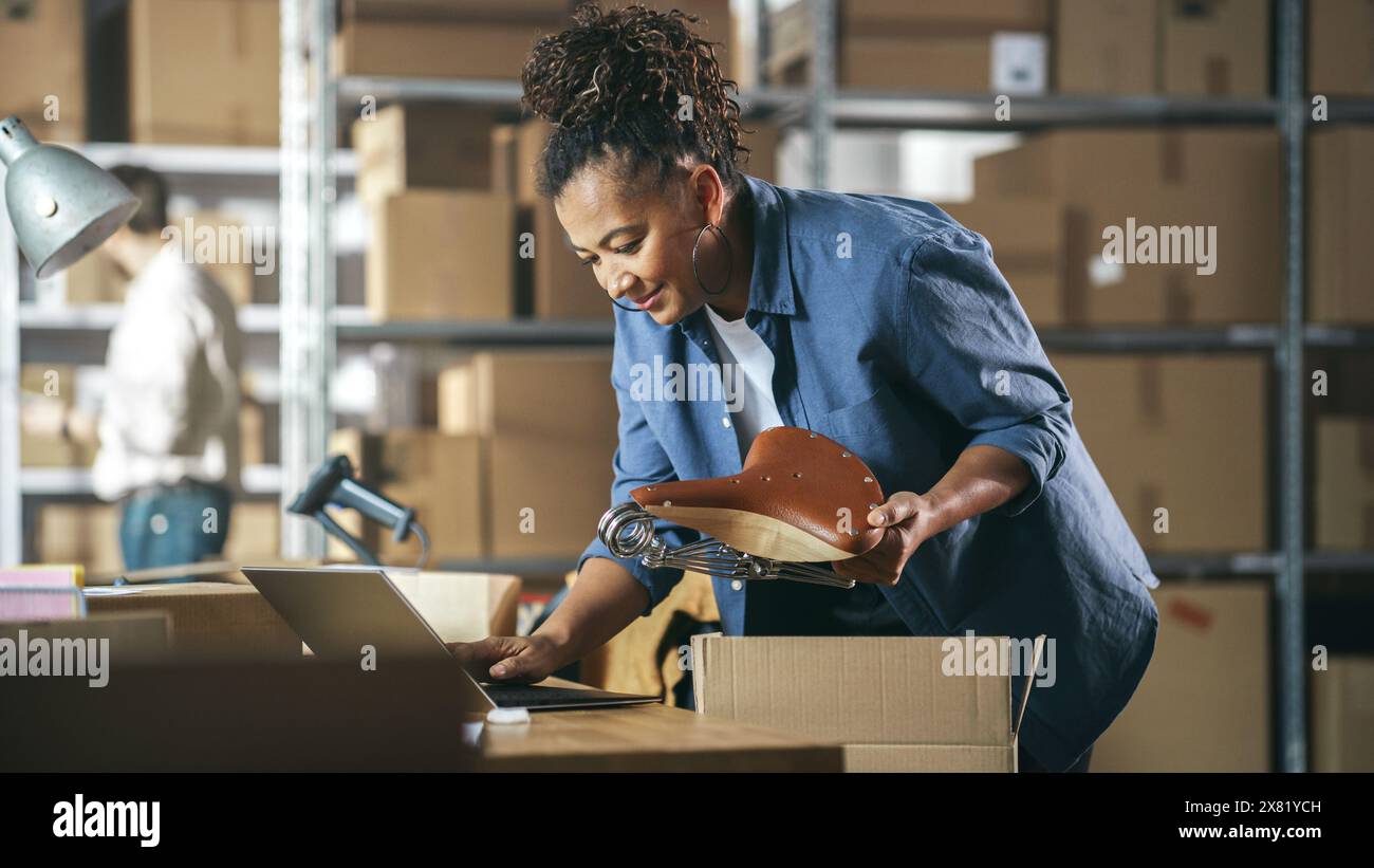 Small Business Owner Packaging a Stylish Bicycle Seat Sold to a Client ...