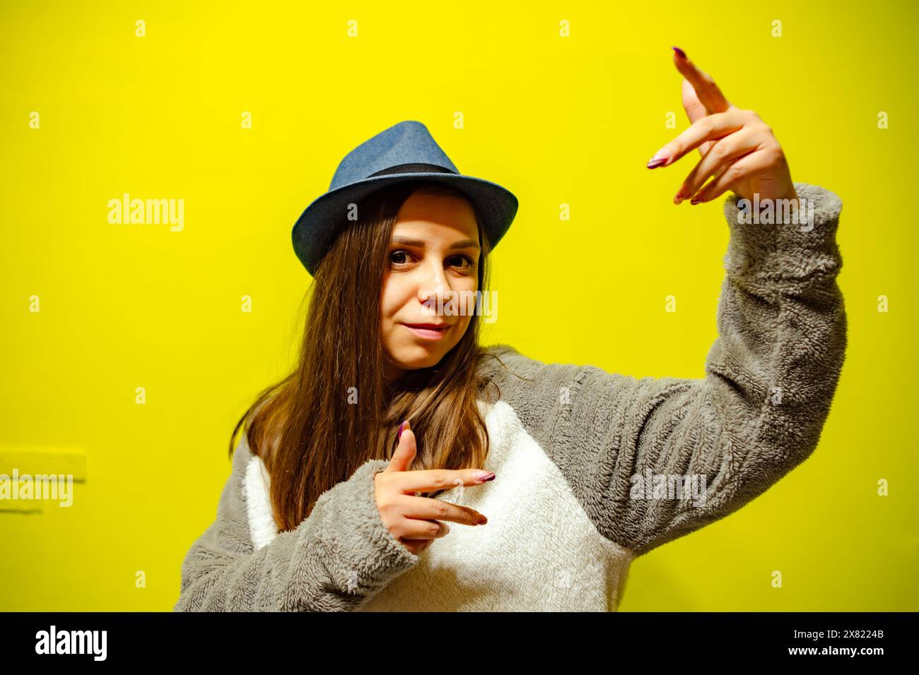 Woman dancing energetically in modern hi-res stock photography and ...