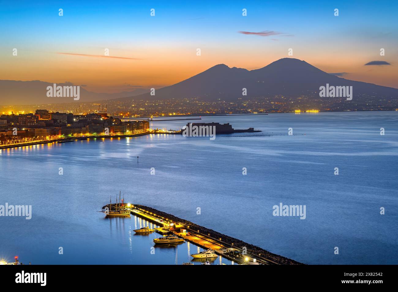 Naples with the famous Mount Vesuvius at dawn Stock Photo - Alamy