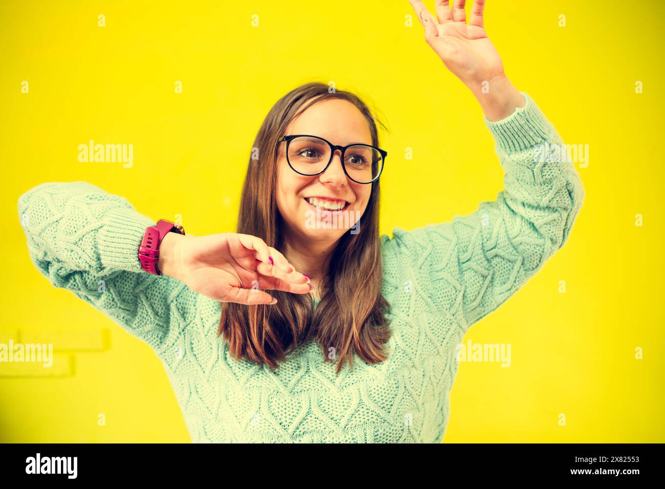 Dynamic joyful woman energetically dancing hi-res stock photography and ...