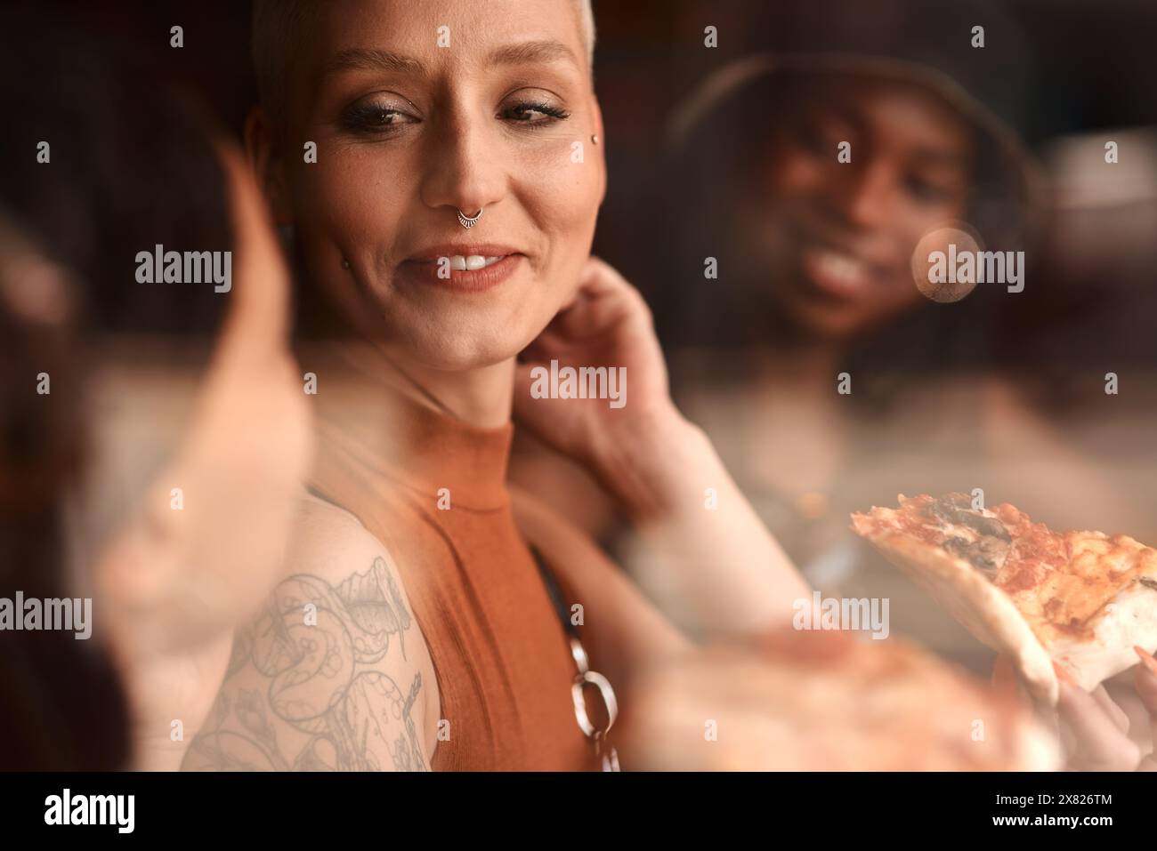 Pizza, friends and women at a restaurant with food, order and slice for ...