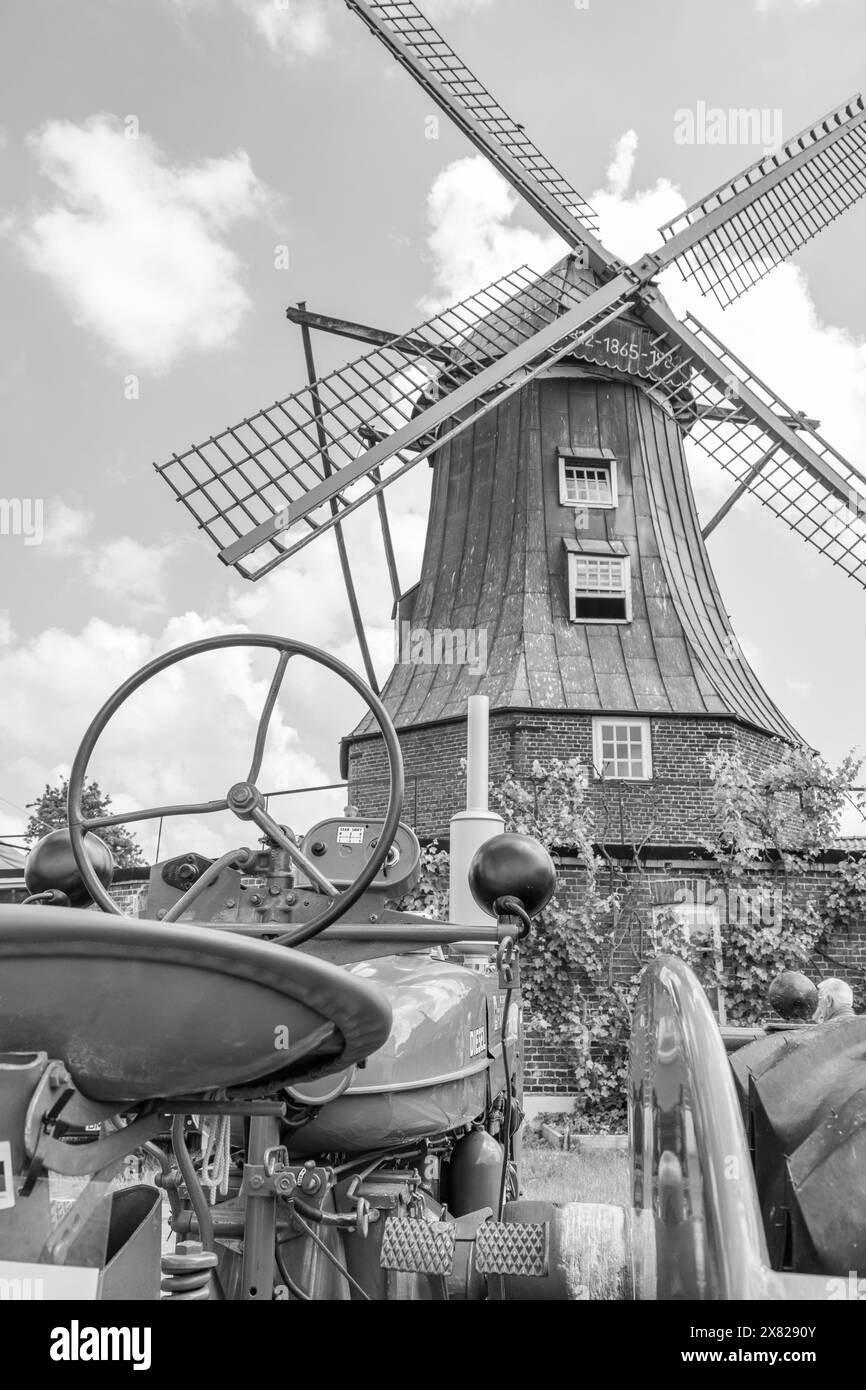 old tractors and a windmill Stock Photo - Alamy