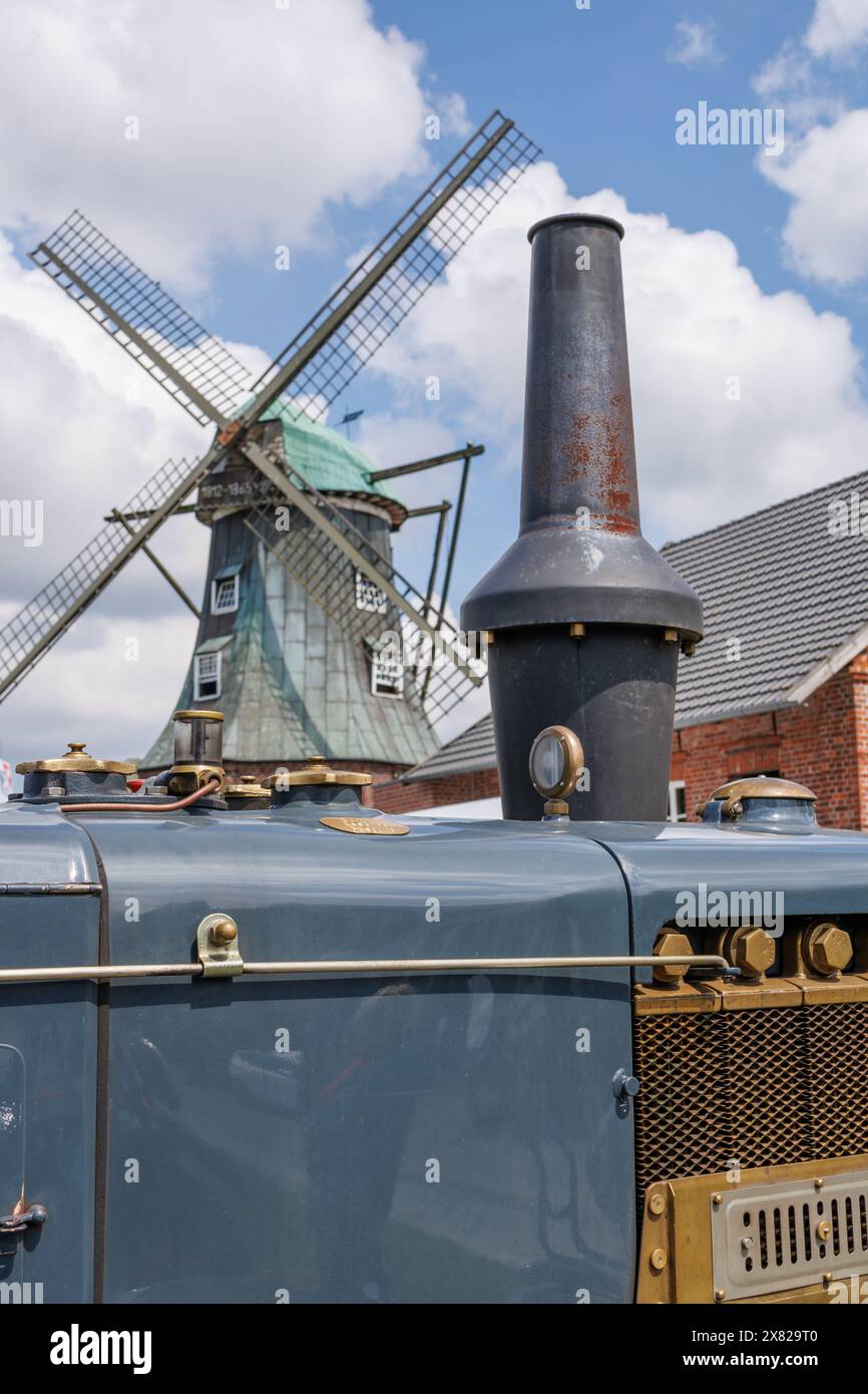 old tractors and a windmill Stock Photo - Alamy