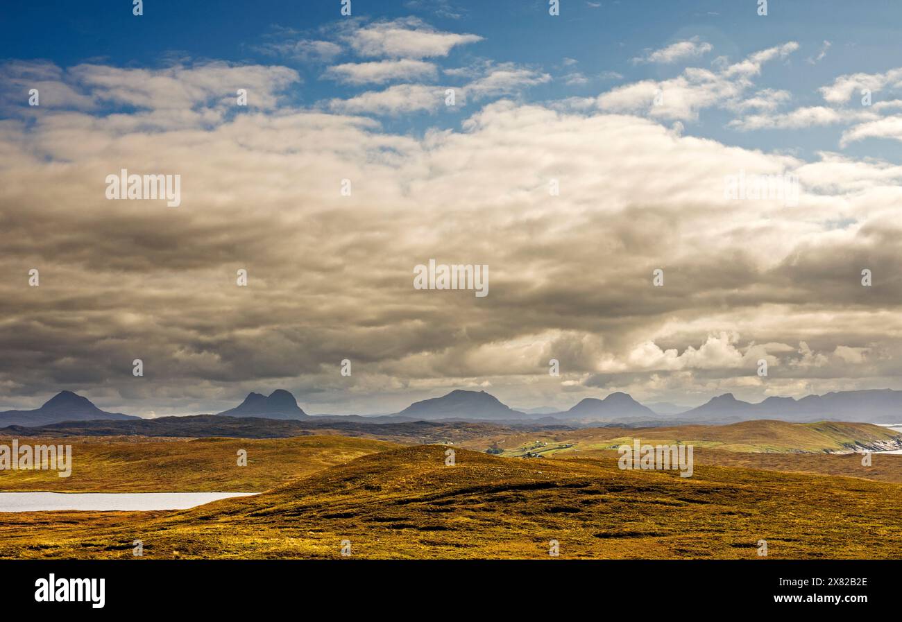 Mountains of Assynt and Coigach, seen in the distance in a line along ...