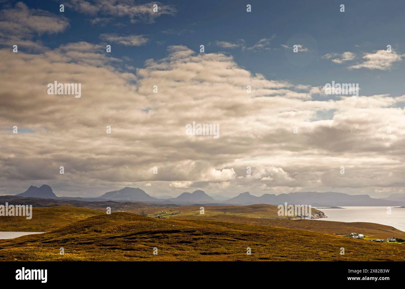 Mountains of Assynt and Coigach, seen in the distance in a line along ...