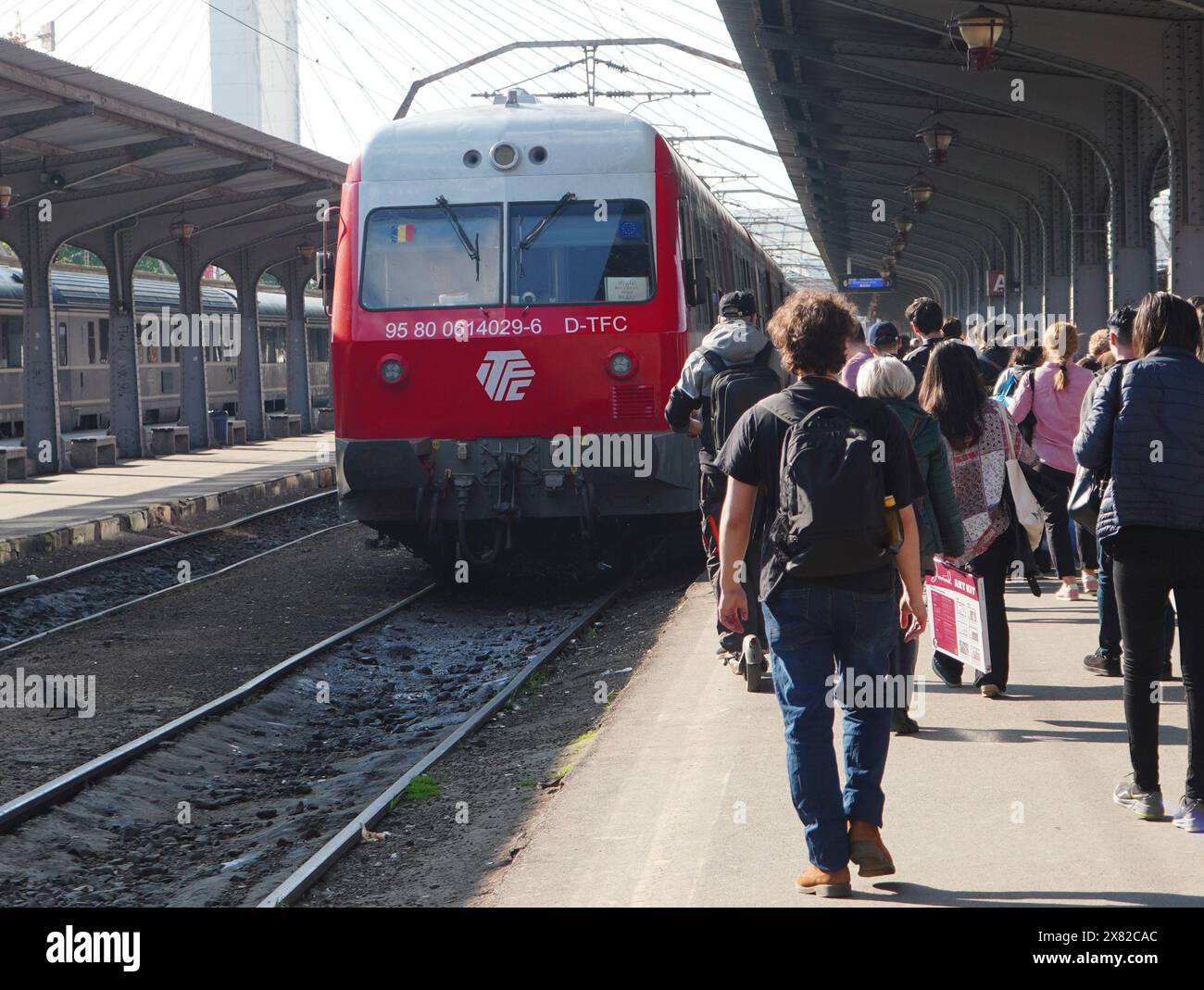 Bucharest, Romania - May 1, 2023: People going towards stationary train ...