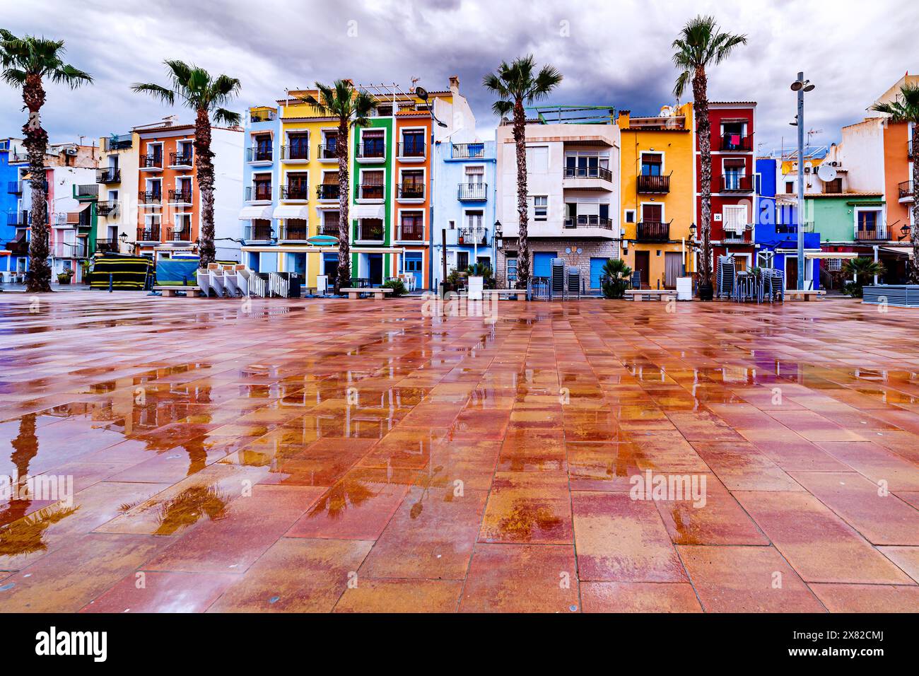 Coloured houses in the rain in Villajoyosa Stock Photo - Alamy