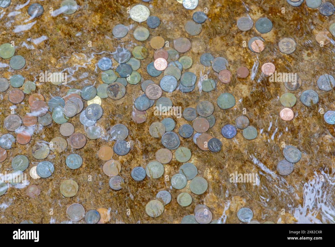 Many Rusty Coins Under Water in Wish Fountain Stock Photo - Alamy
