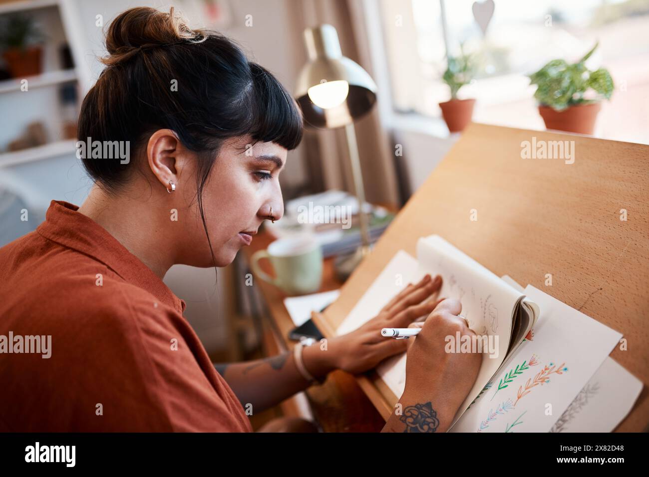 Woman, artist and creative drawing in studio or sketching hobby for ...