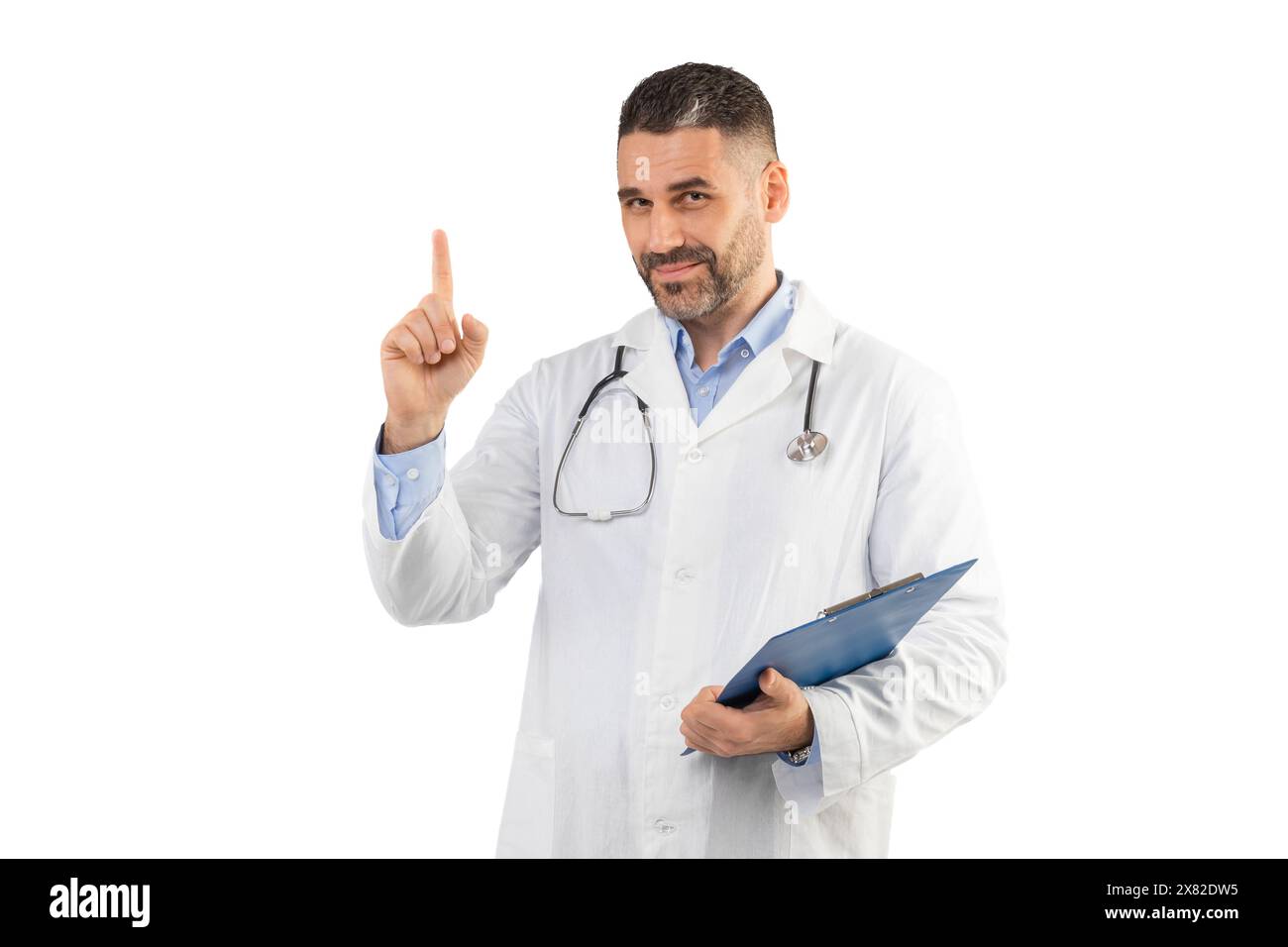 Confident Man Doctor Pointing Up While Holding Clipboard Stock Photo ...