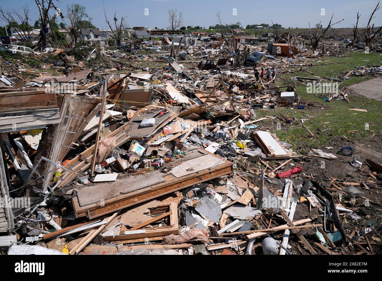 Debris from tornado damaged homes is seen, Wednesday, May 22, 2024, in ...