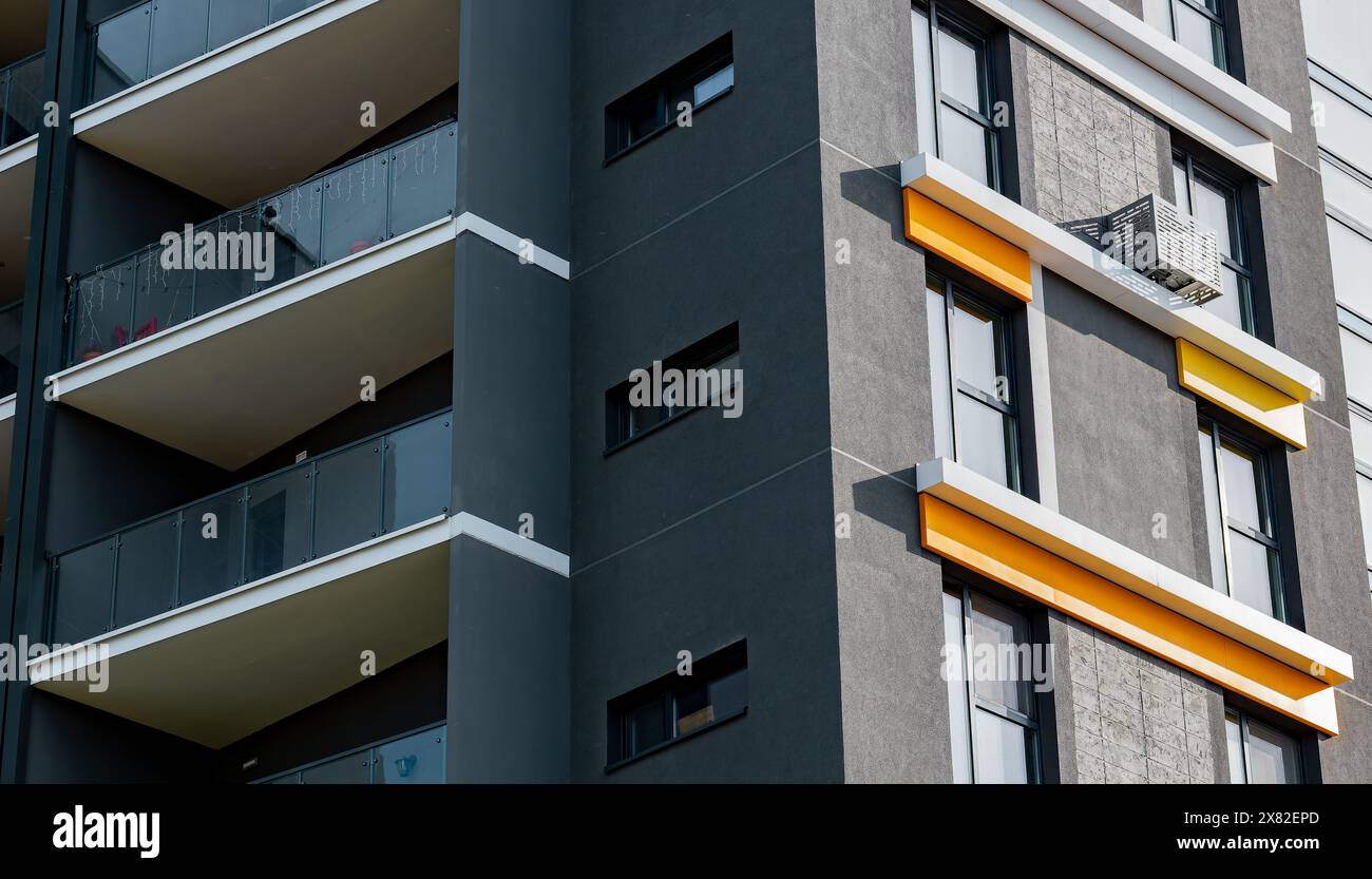 Modern residential building, new apartment block with balcony, exterior ...