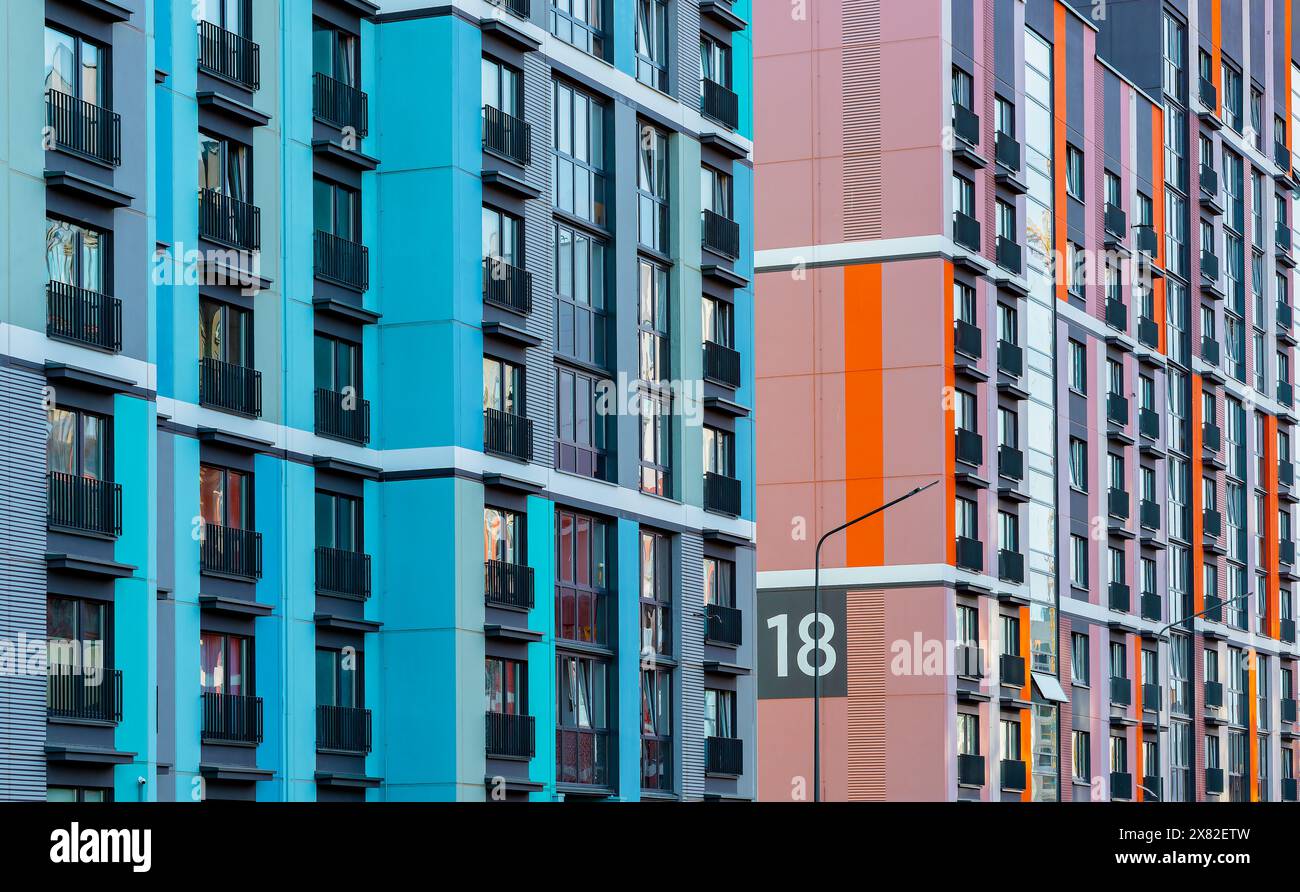 Modern residential building, new apartment complex with colorful ...