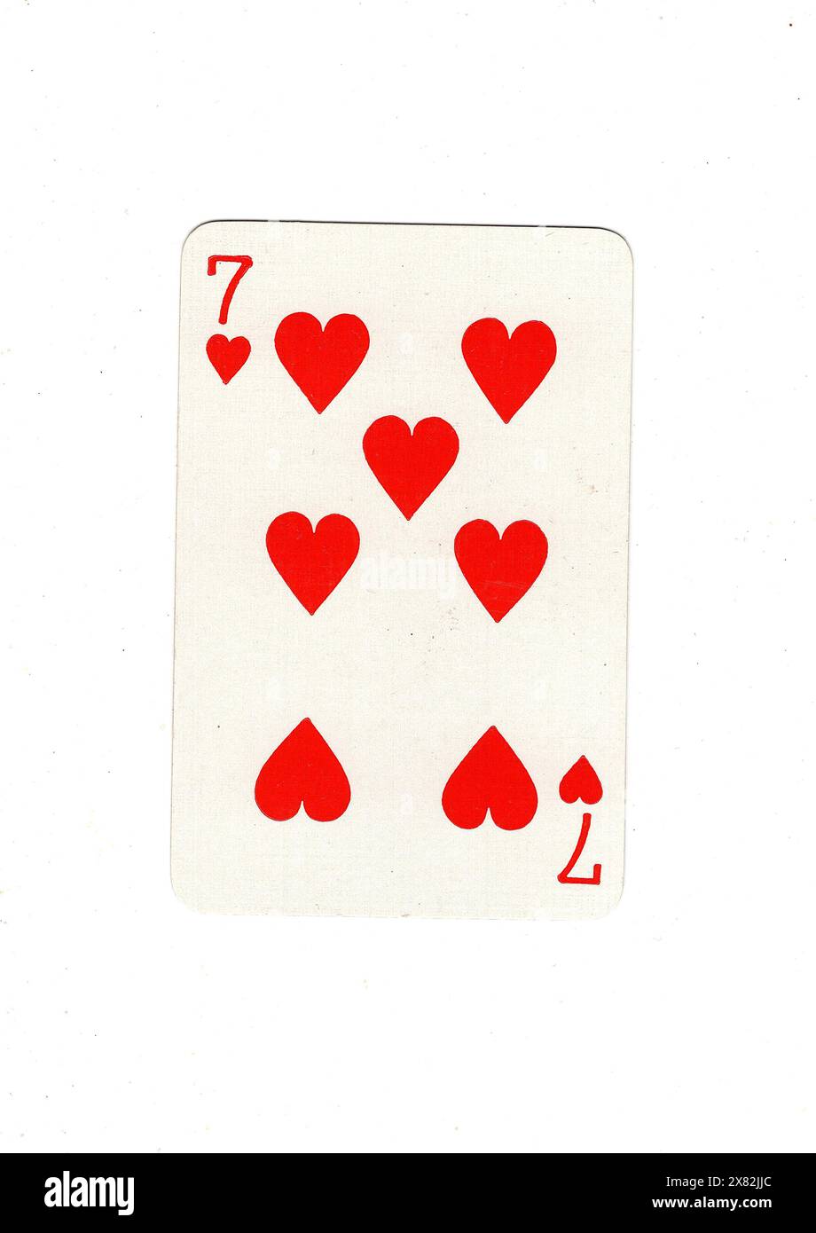 A seven of hearts playing card on a white background Stock Photo - Alamy