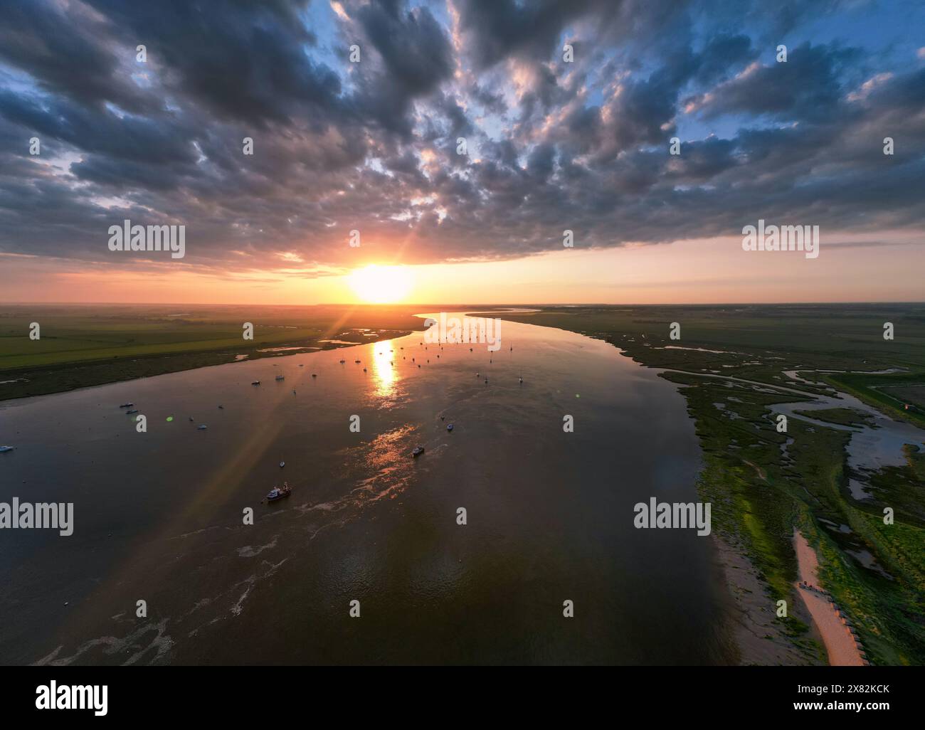 An aerial view of a spectacular sunset over the River Deben at Bawdsey ...