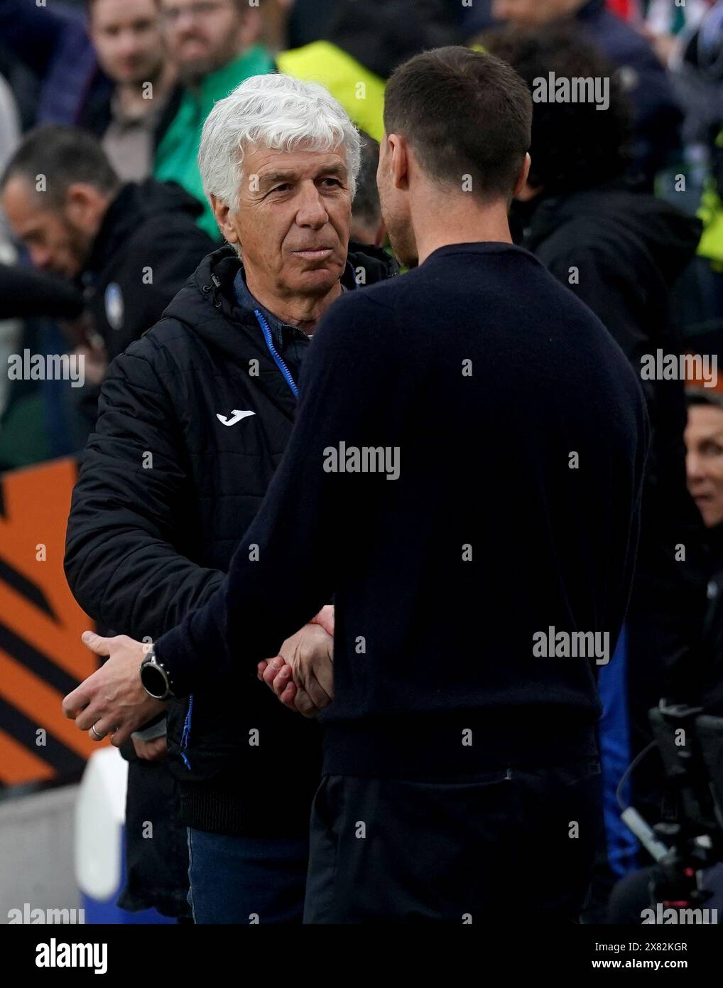 Atalanta manager Gian Piero Gasperini (left) and Bayer Leverkusen ...
