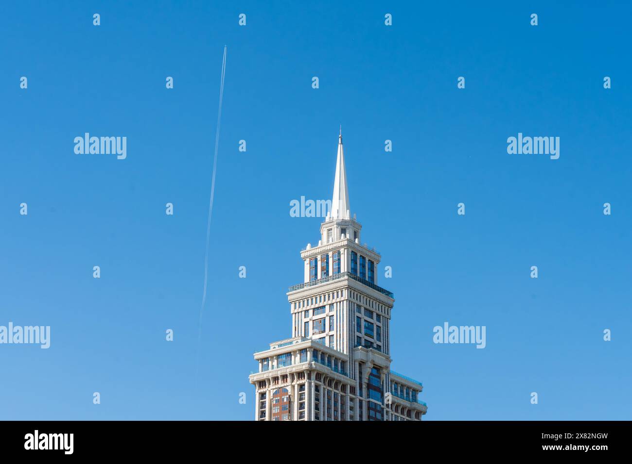 The tower of the high-rise building Triumph Palace against the ...