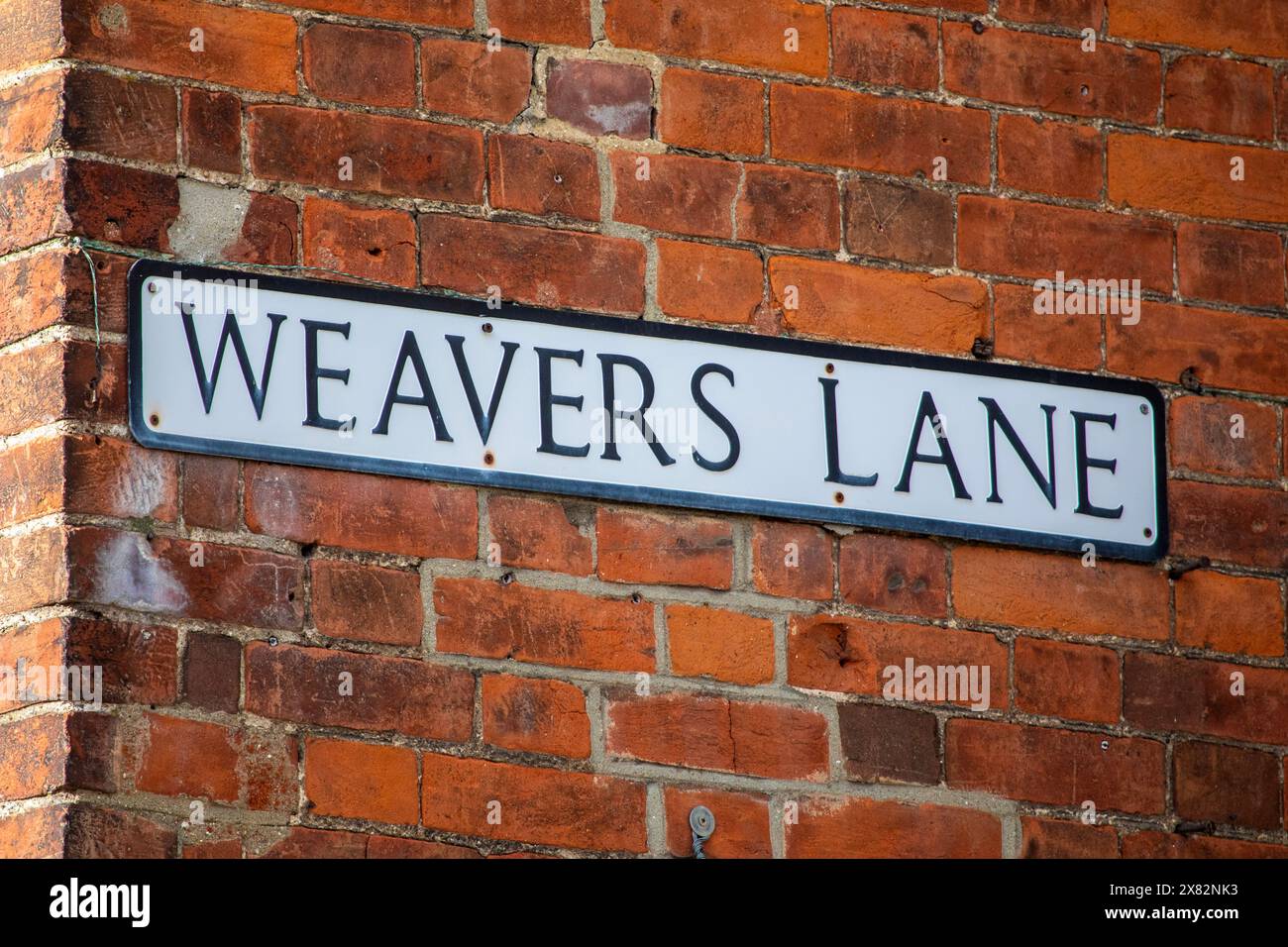 The street sign for Weavers Lane in the town of Sudbury in Suffolk, UK ...