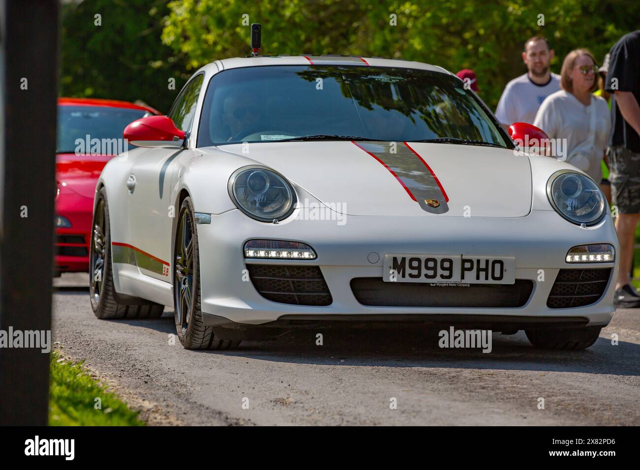 Porsche 911 Entering a car show Stock Photo - Alamy