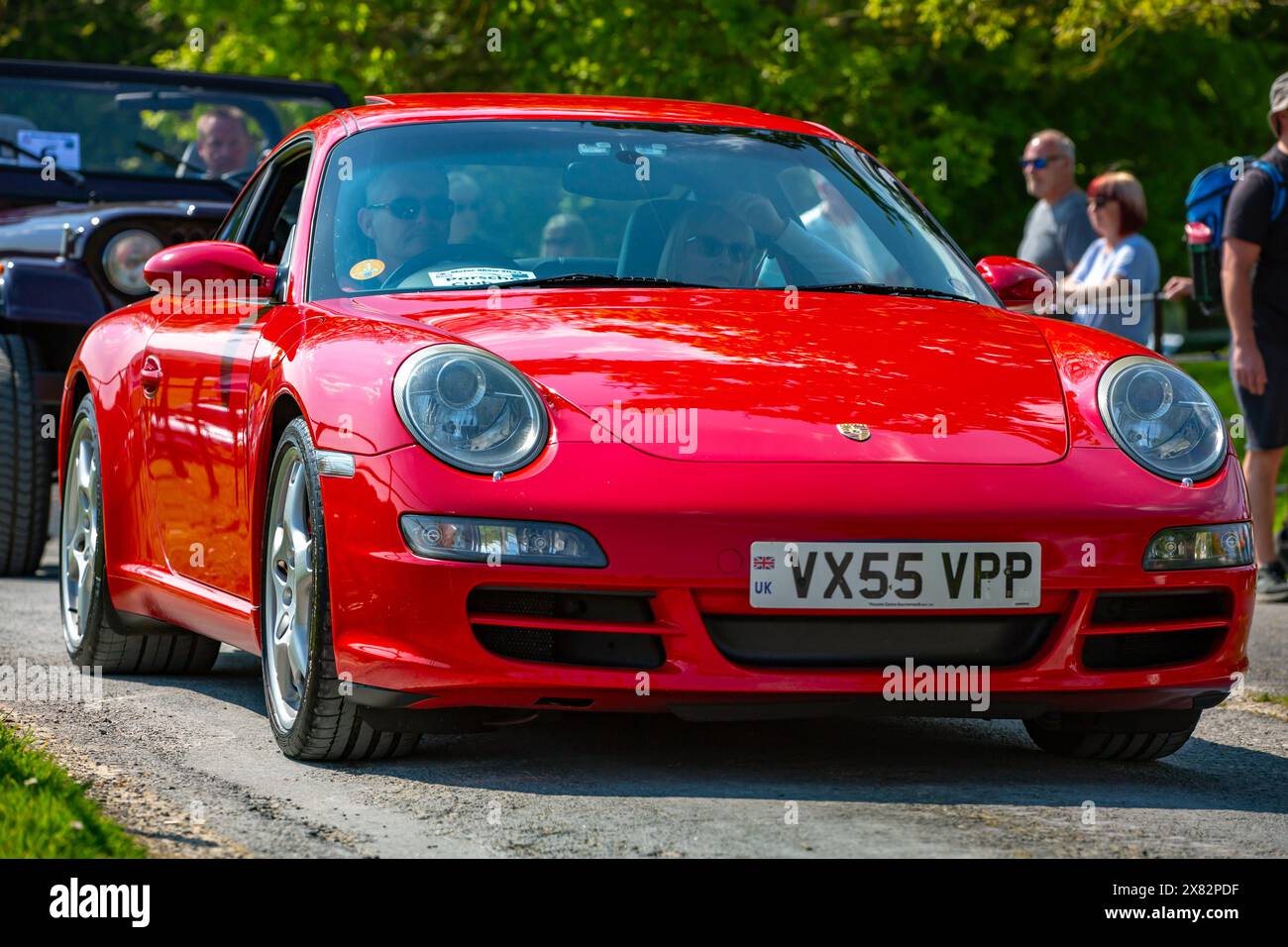 Porsche 911 Entering a car show Stock Photo - Alamy