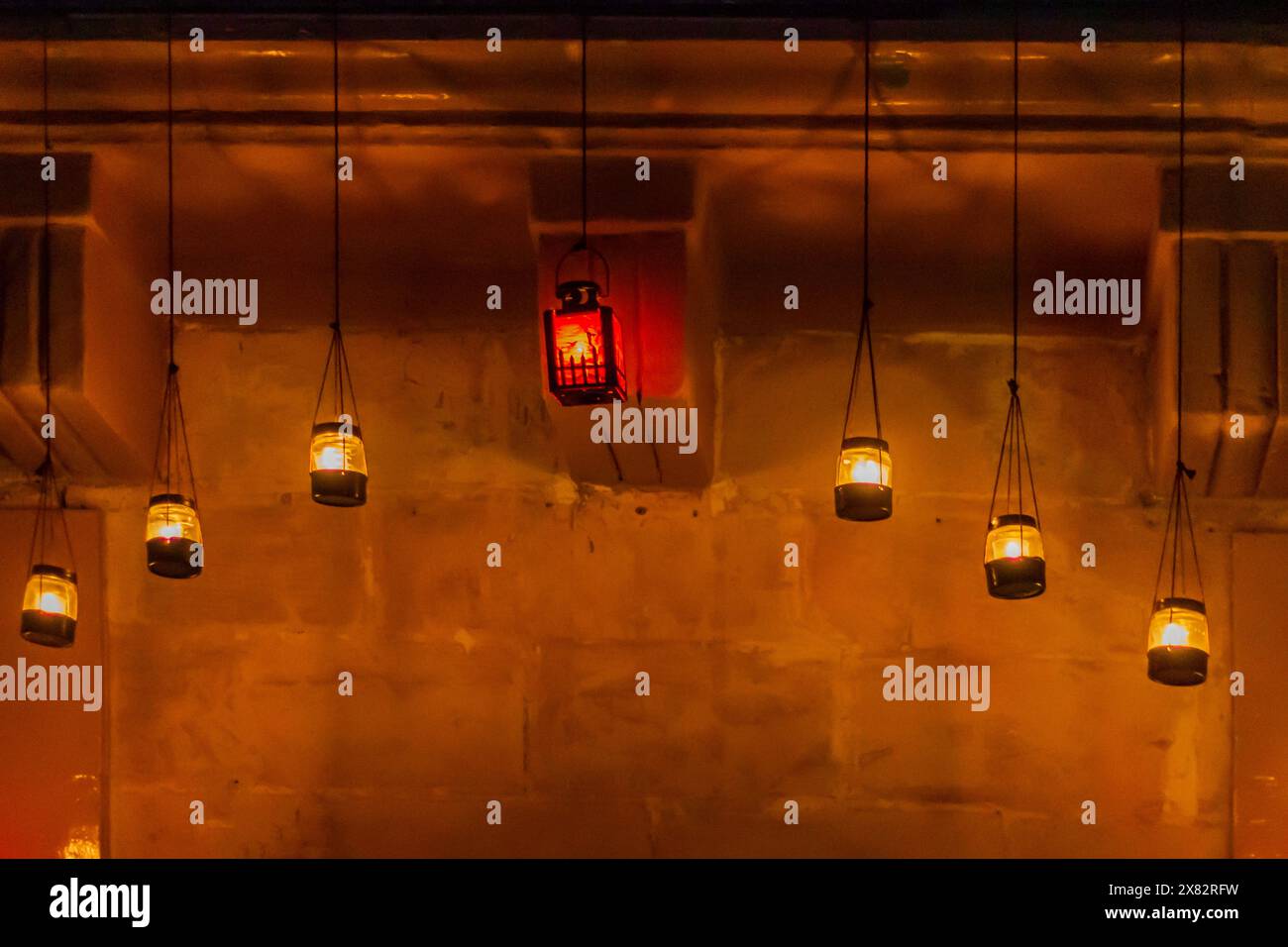 A festive night in Birgu with glowing lanterns and old-fashioned ...