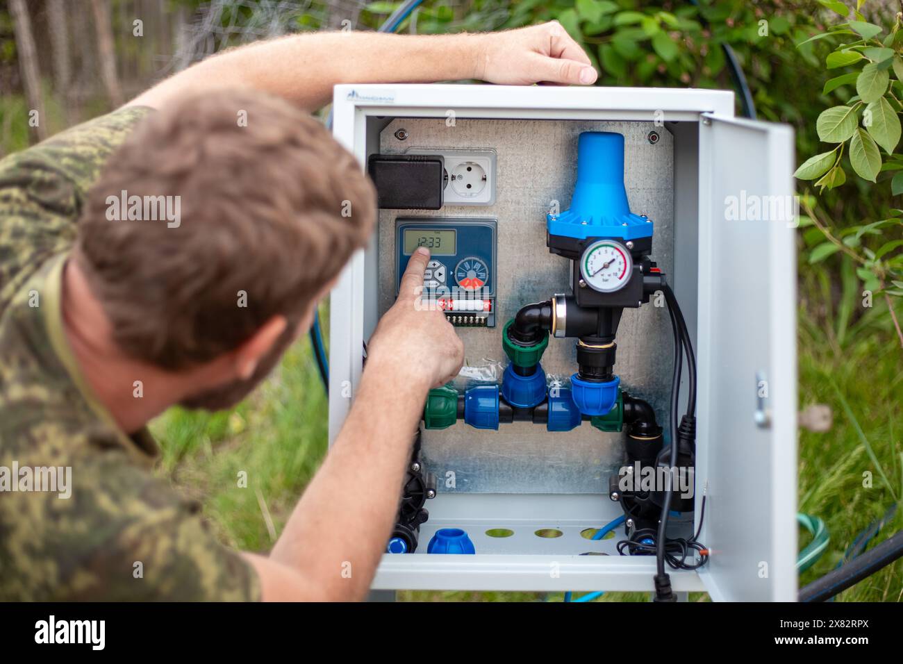 Setting up an automatic water supply system for drip irrigation. The ...