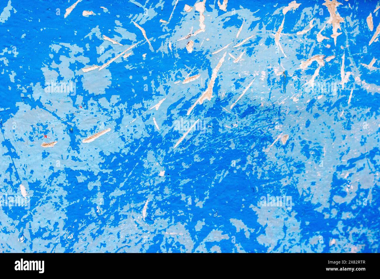 Abstract blue paint pattern on textured azure wallpaper. Full frame ...