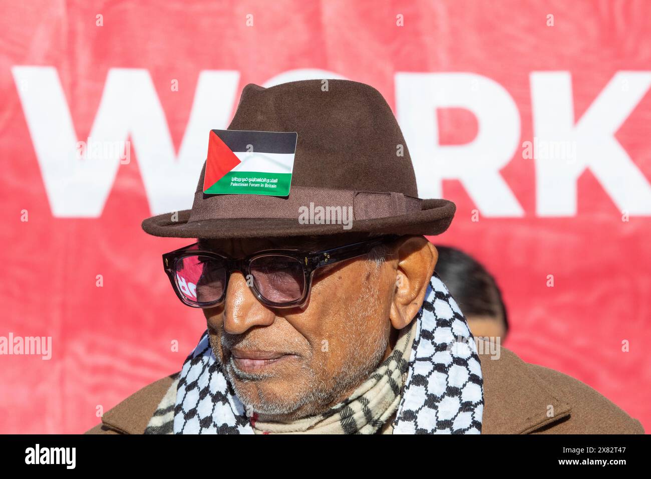 London, UK - November 11th 2023: A protester wearing a Palestinian ...