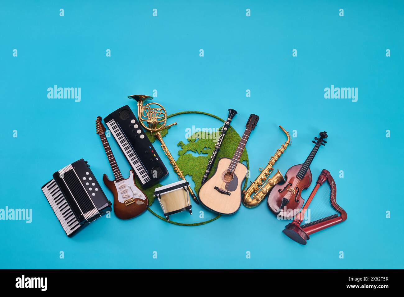 World Music Day. Assortment of Musical Instruments with world map on Blue background Stock Photo ...