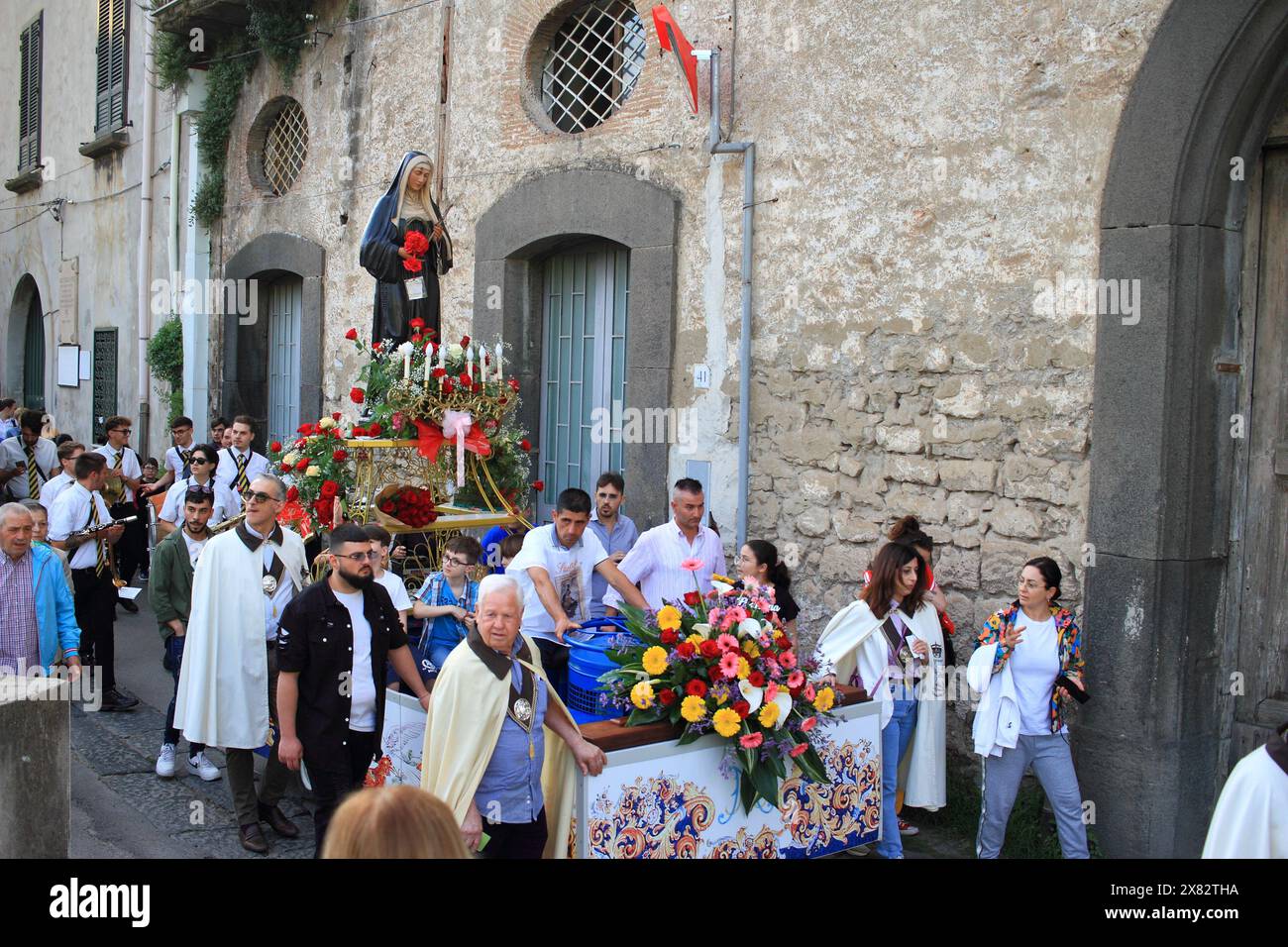 The statue of Santa Rita da Cascia is carried in procession through the ...