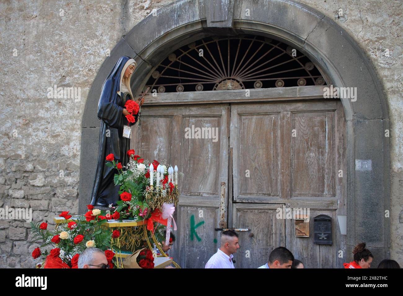 The statue of Santa Rita da Cascia is carried in procession through the ...