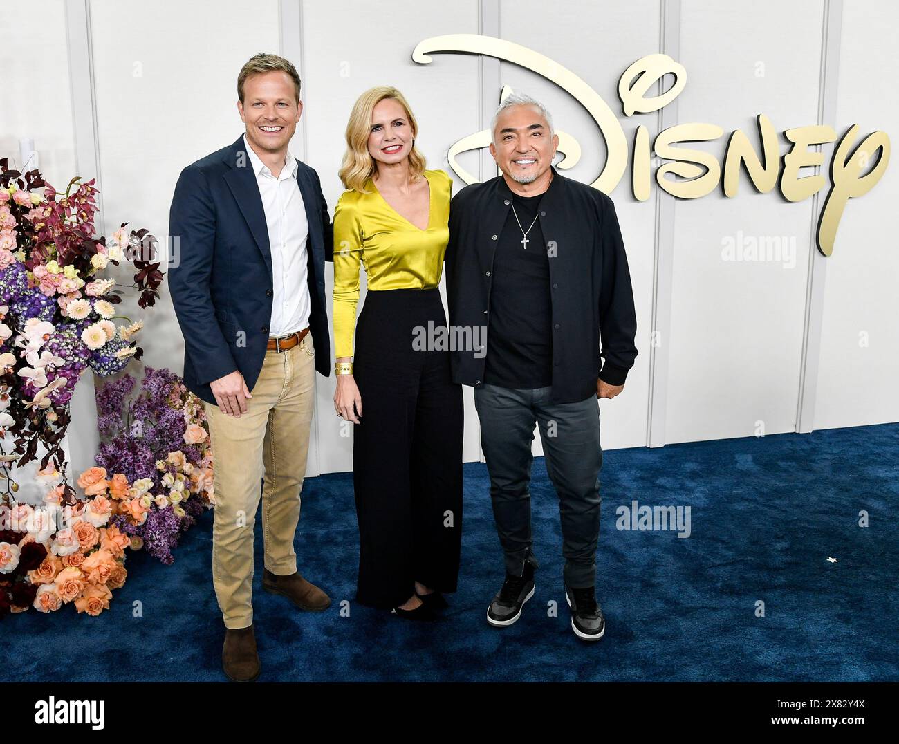 Bertie Gregory, left, Mariana Van Zeller and Cesar Millan attend the ...