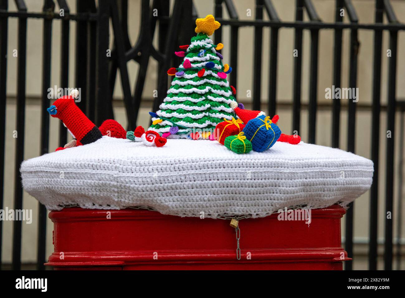 London, UK - February 5th 2024: Close-up of a Christmas-themed knitted ...
