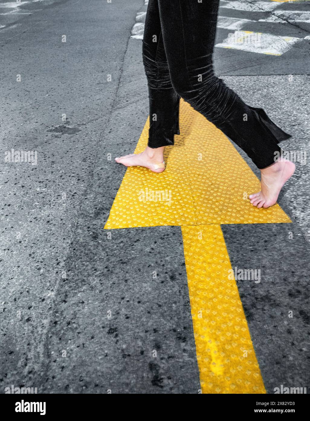 Beautiful black-haired girl on the street, fashion shoot. Wide angle ...