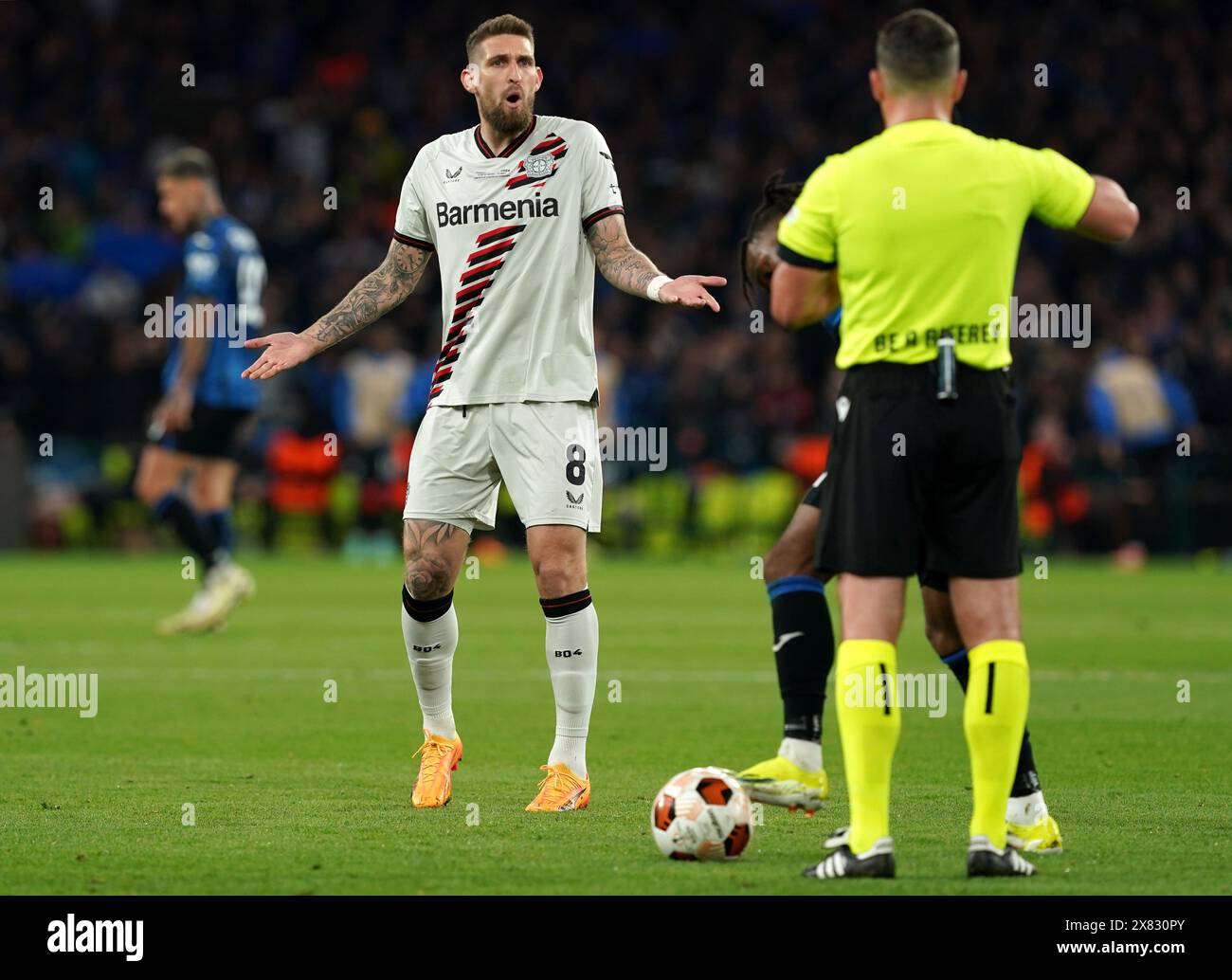 Bayer Leverkusen's Robert Andrich reacts after being penalised during ...