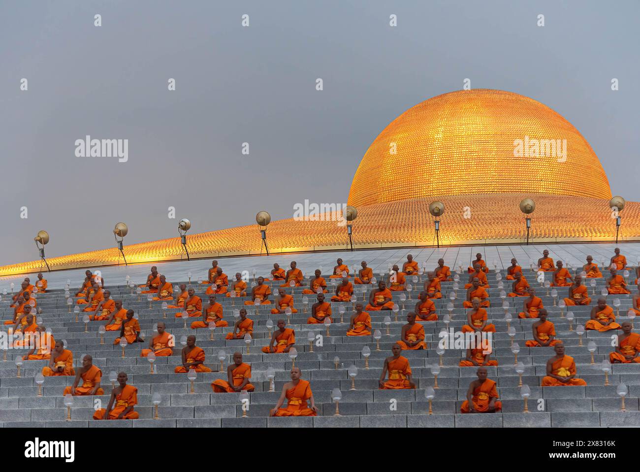 Pathum Thani, Thailand. 22nd May, 2024. Buddhist monks meditate during ...
