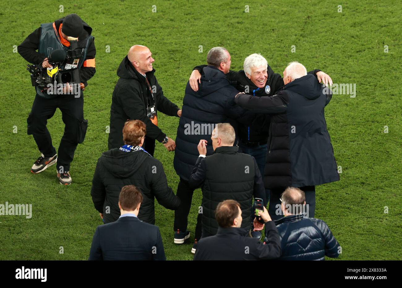 Atalanta manager Gian Piero Gasperini (second right) celebrates with ...