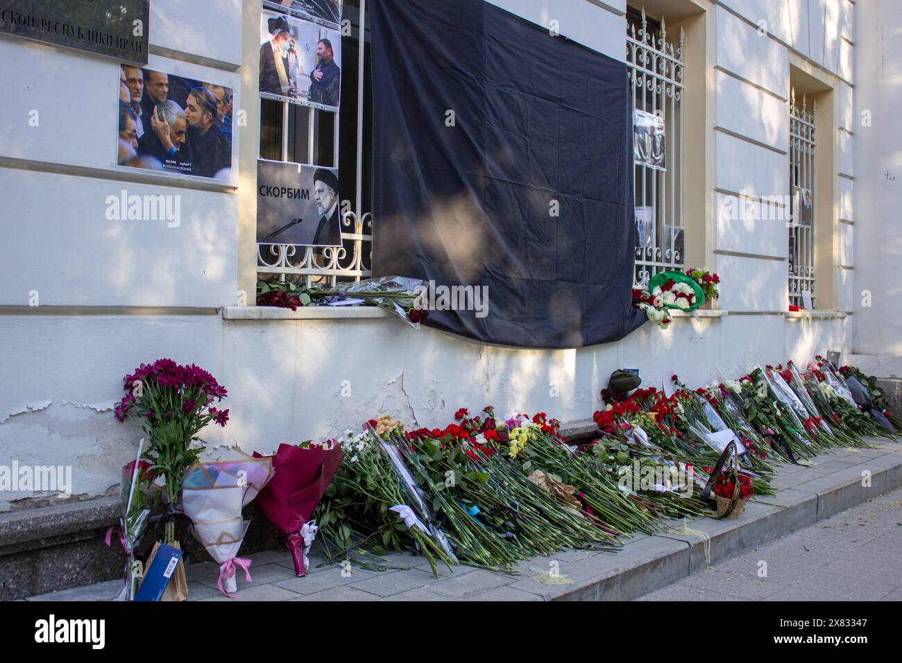 Moscow, Russia. 22nd May, 2024. Flowers and photos are seen at the ...