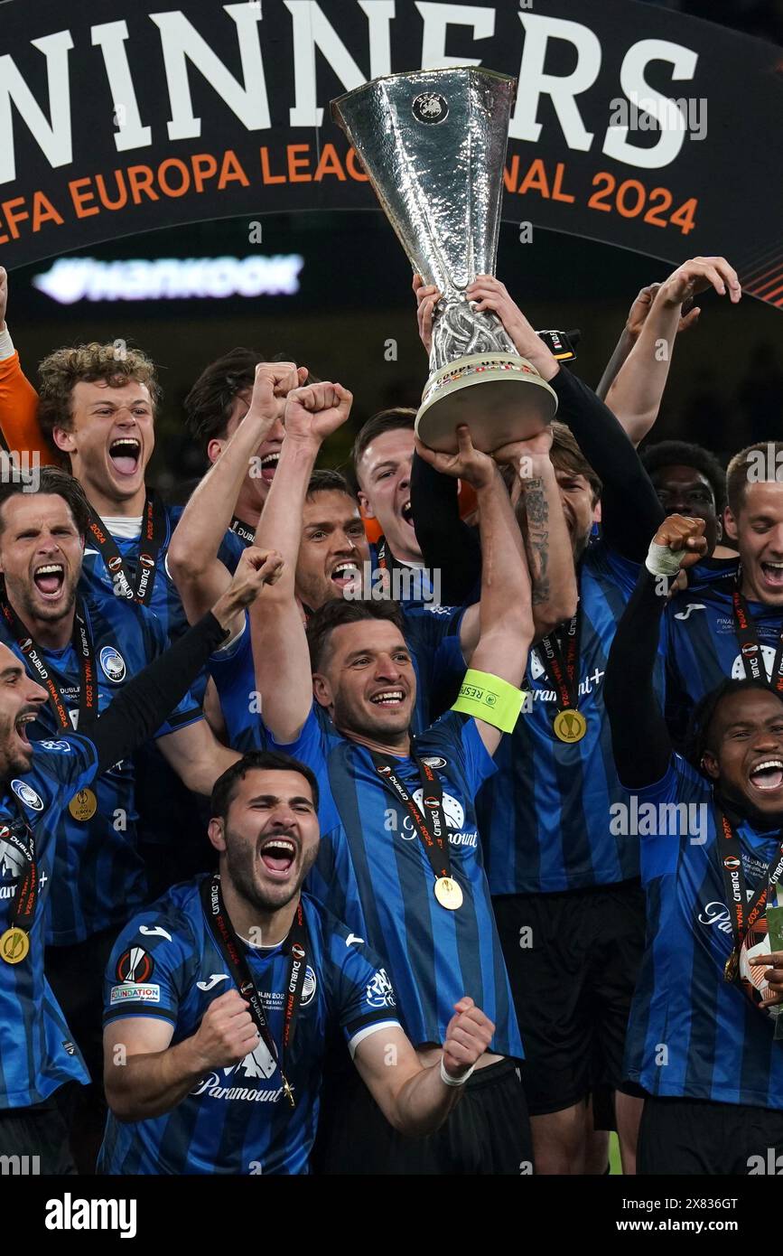 Atalanta captain Berat Djimsiti and team-mates celebrate with the ...