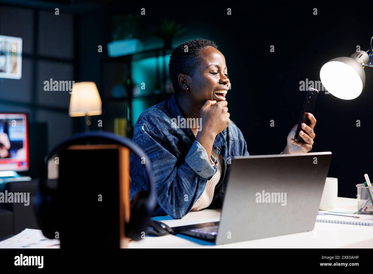 Young african student uses cellphone hi-res stock photography and ...