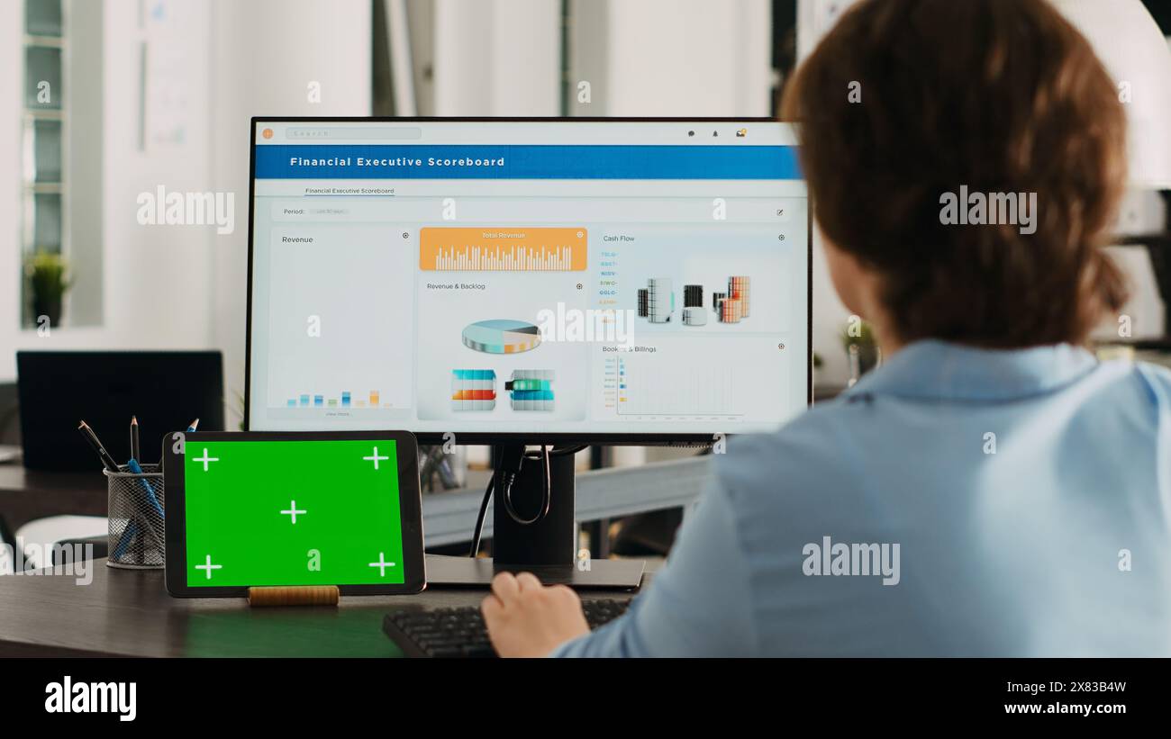 Office worker checks greenscreen display hi-res stock photography and images - Alamy