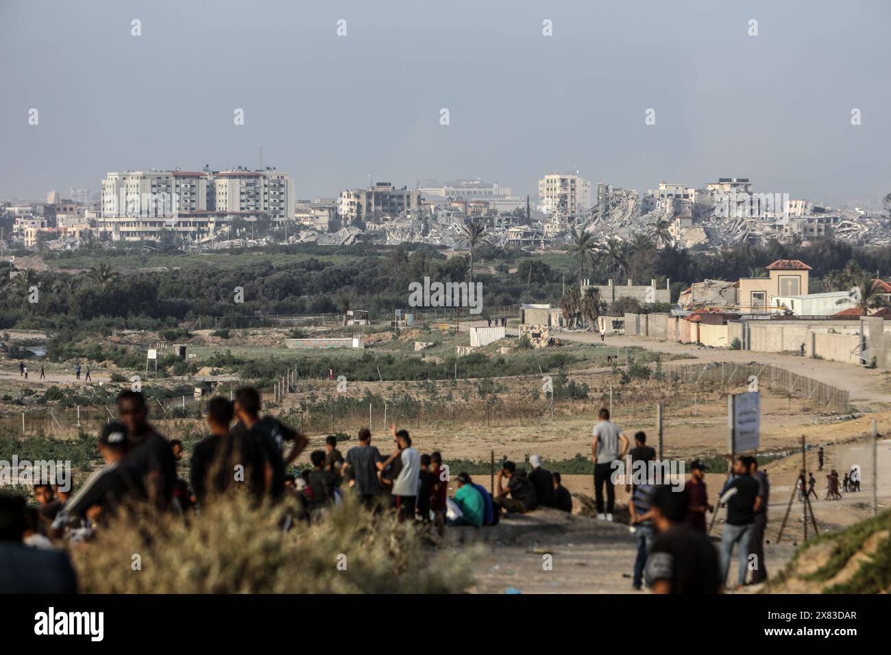 Gaza City, Palestinian Territories. 22nd May, 2024. Palestinians sit ...