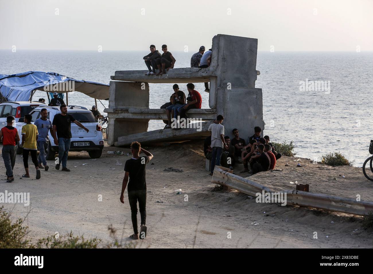 Gaza City, Palestinian Territories. 22nd May, 2024. Palestinians sit ...