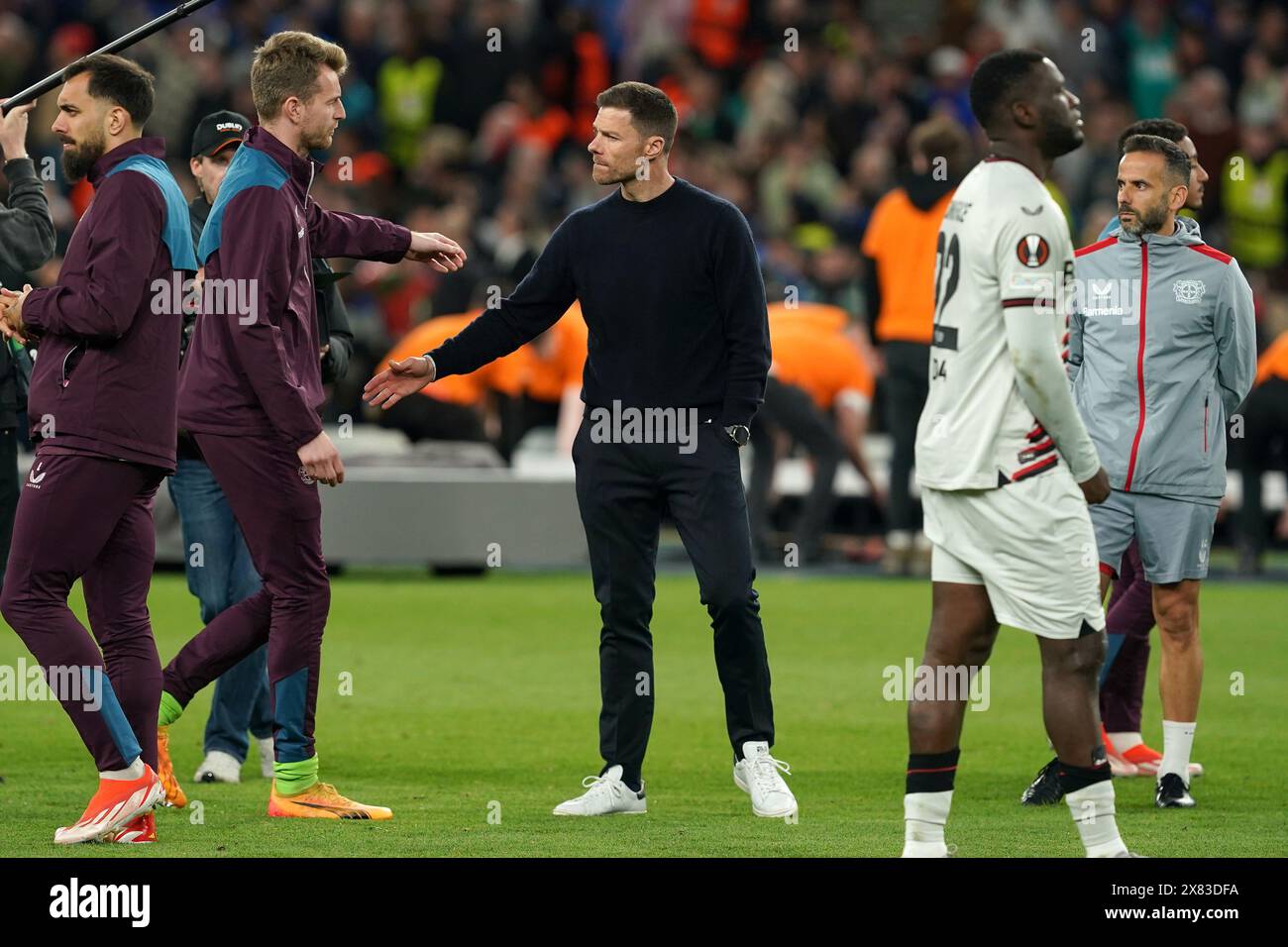 Bayer Leverkusen manager Xabi Alonso and the players appear dejected ...