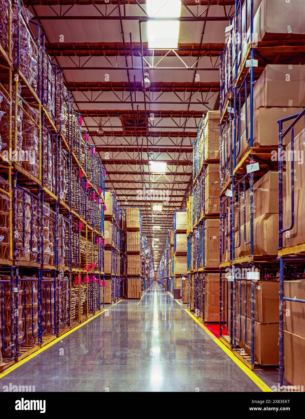 A stocked warehouse with shelving and boxes Stock Photo - Alamy