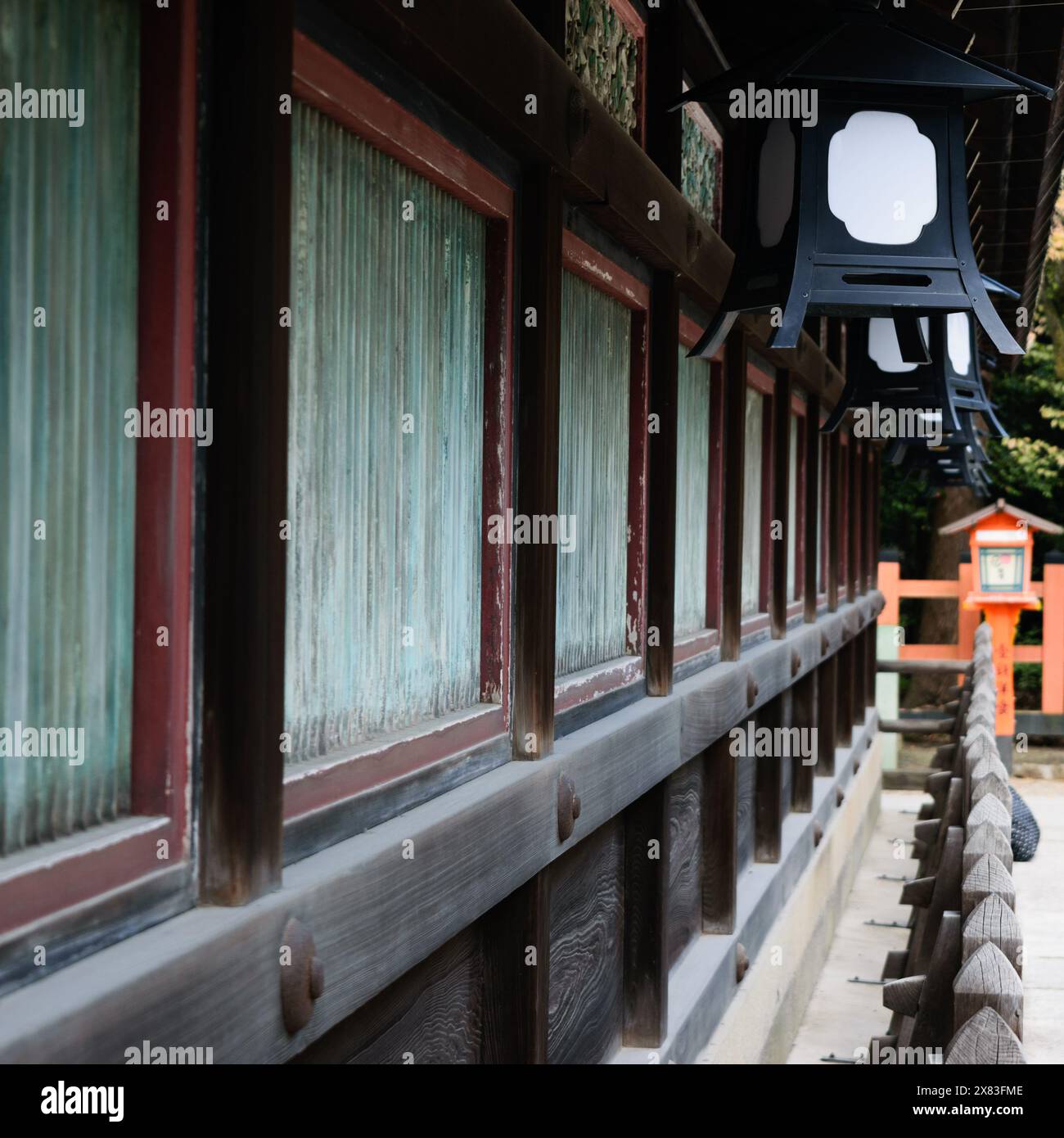 Close-up of a traditional Japanese building with wooden walls and metal ...
