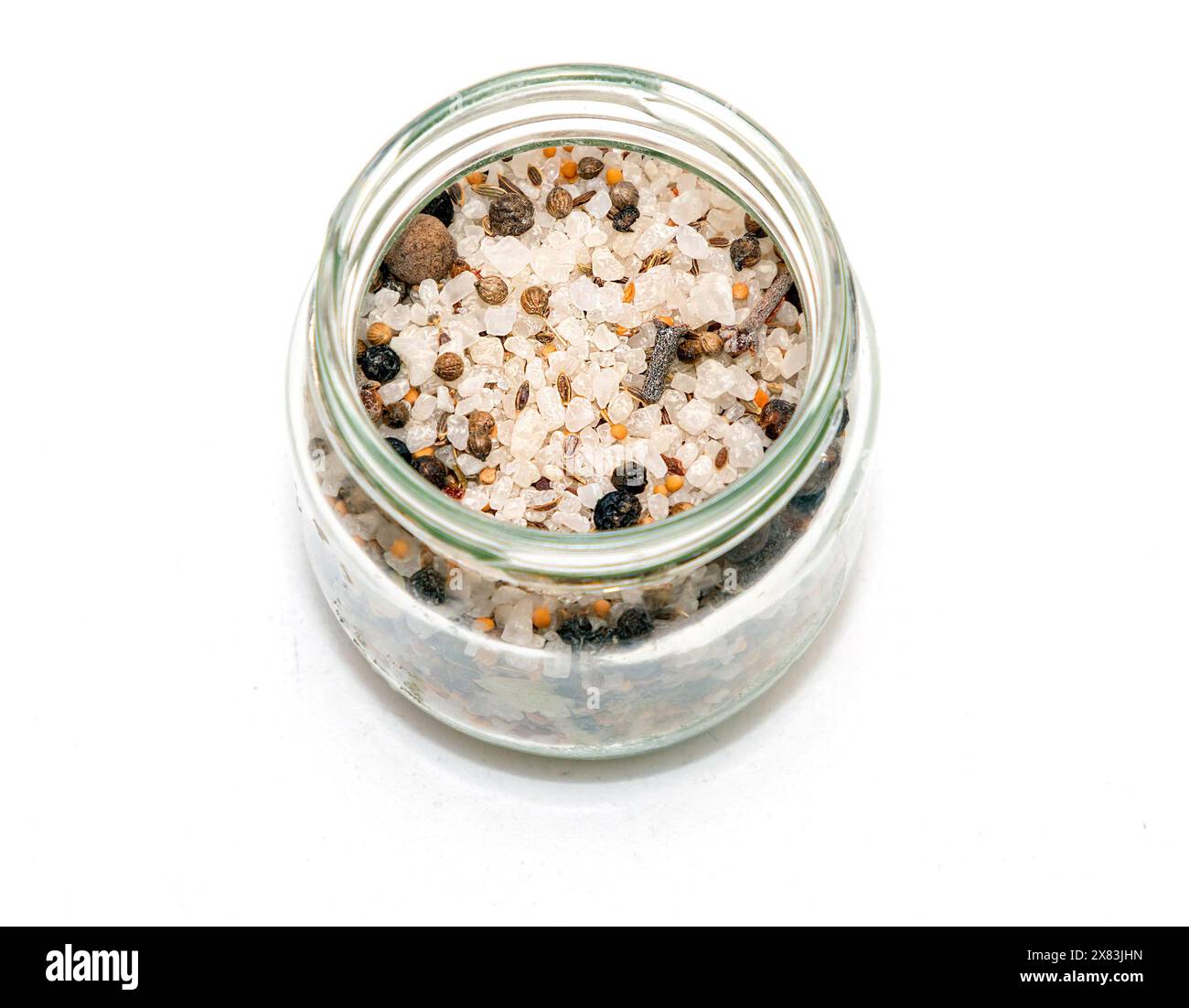 Jar salt on table Cut Out Stock Images & Pictures - Alamy
