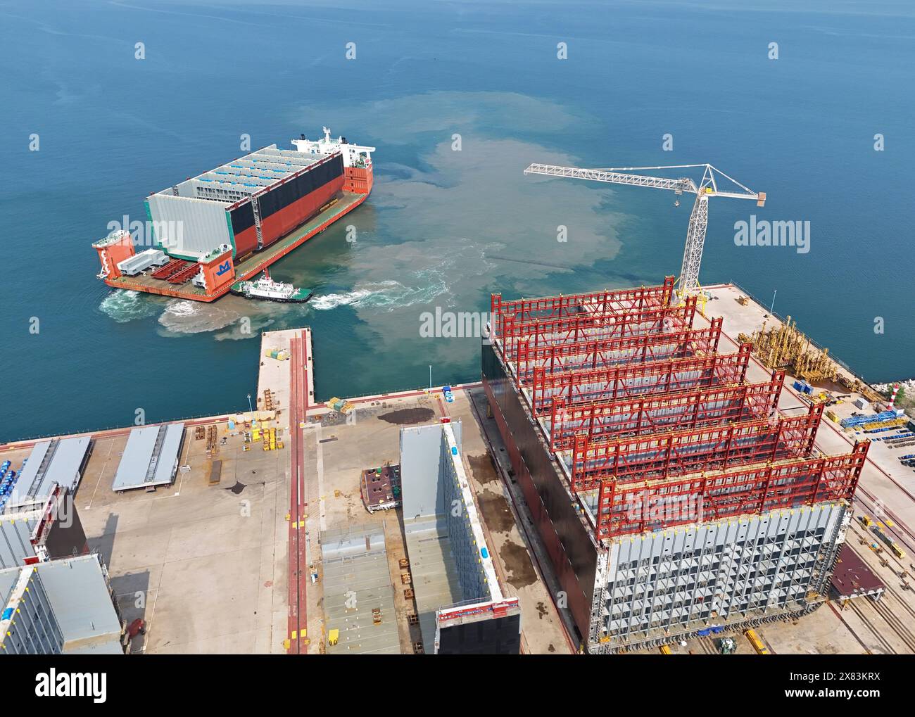 YANTAI, CHINA - MAY 22, 2024 - A semi-submersible vessel loaded with ...