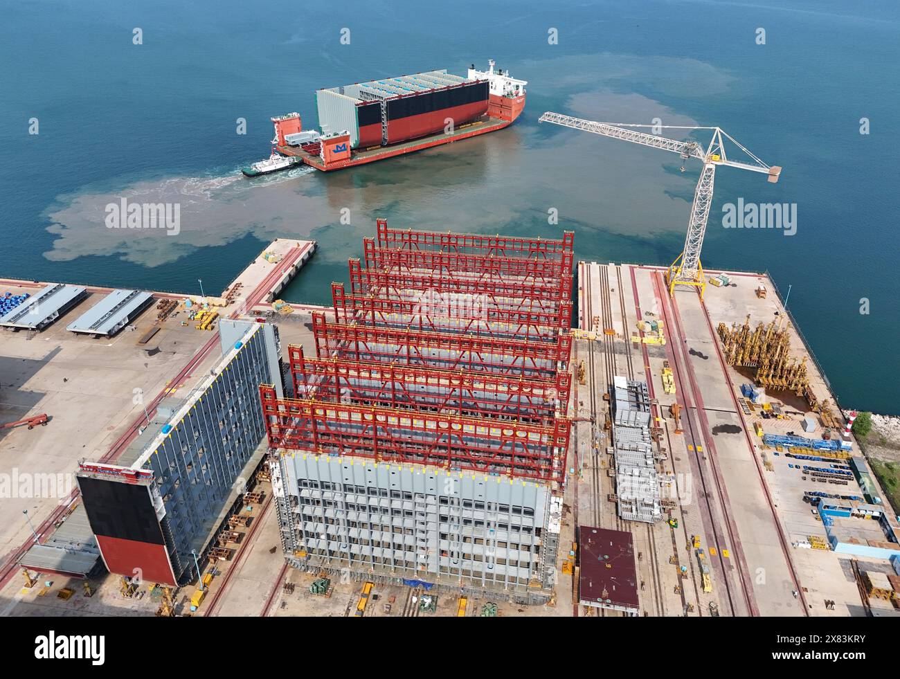 YANTAI, CHINA - MAY 22, 2024 - A semi-submersible vessel loaded with ...